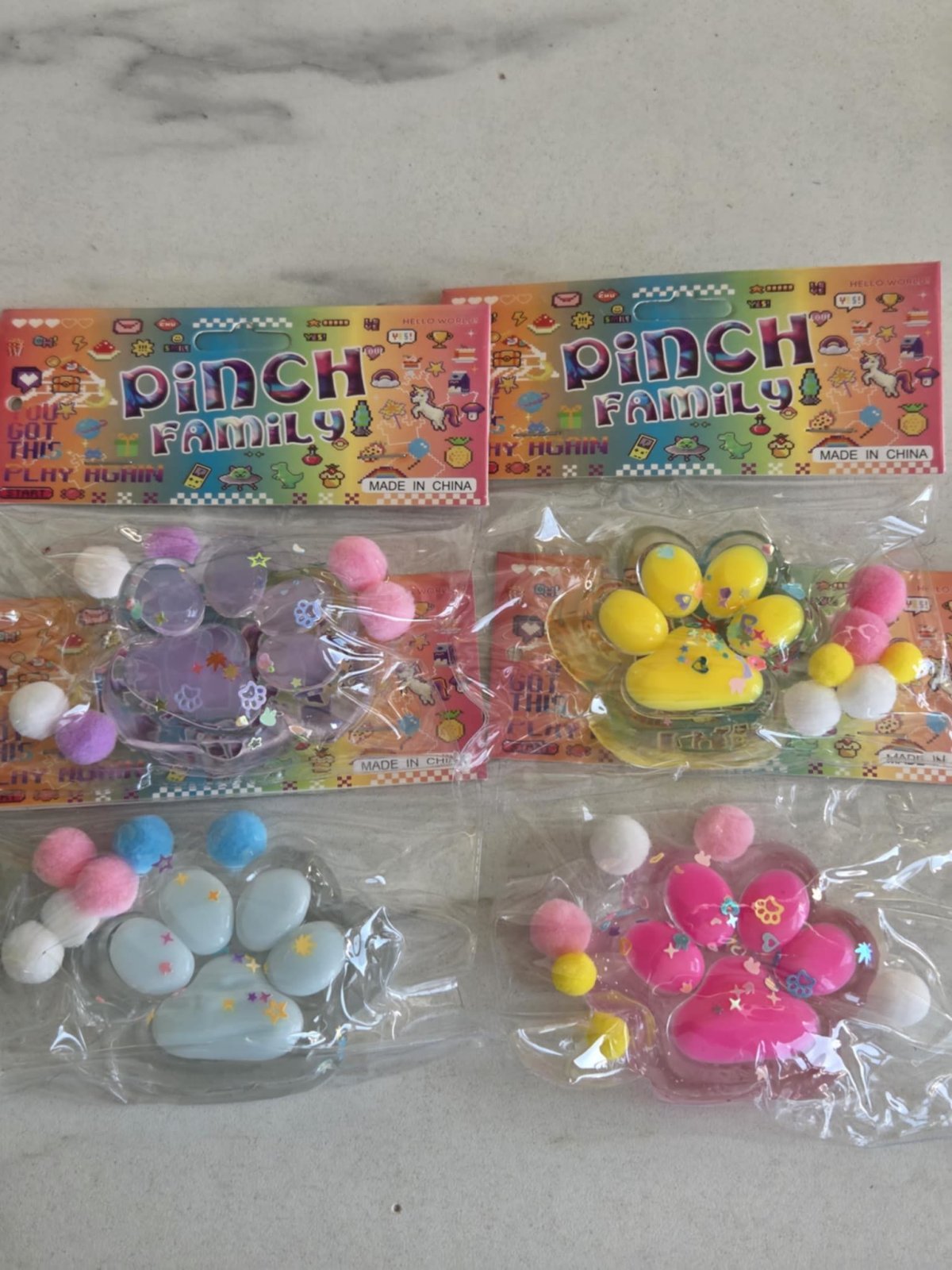 Paw Squishies – Clear Dyrepote Squishies med Farvede Puder og Glimmer ...